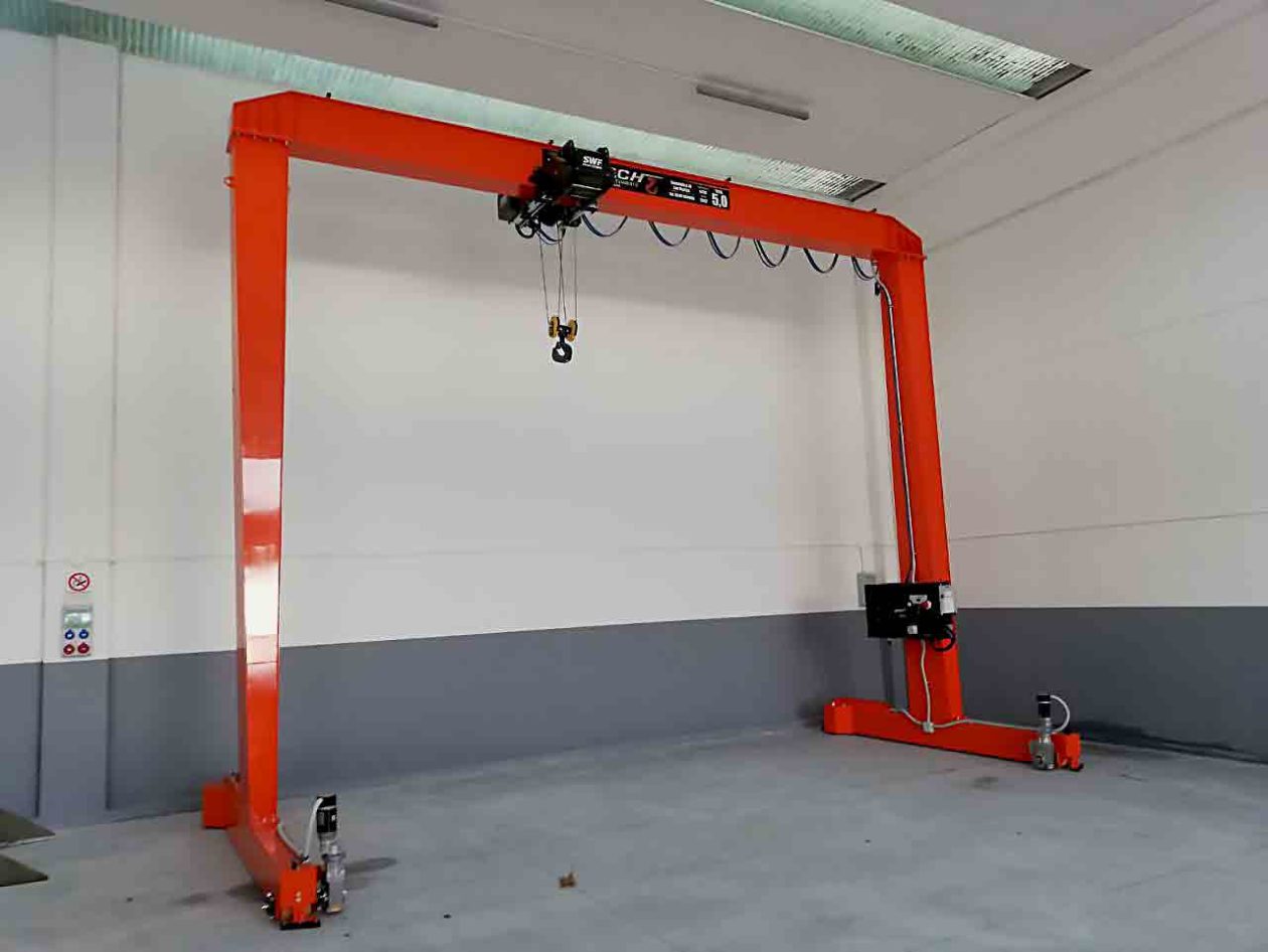 Gru a portale telecomandata - Alfatech - Specialisti in impianti di ...
